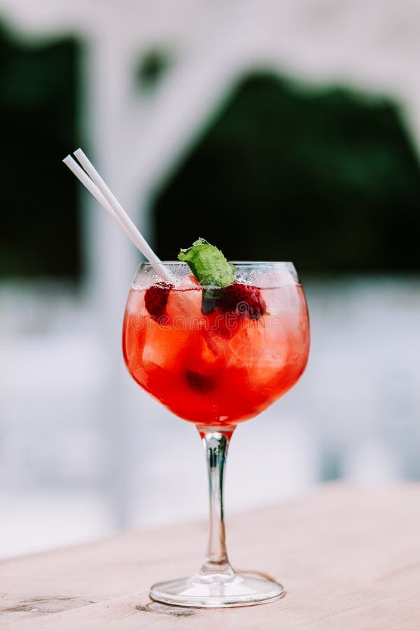 Red cocktail in a glass stock image. Image of colorful - 127377967