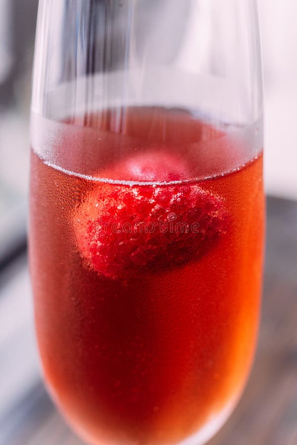 Close Up Red Cocktail with Raspberry Inside in Glass Wine Stock Photo ...