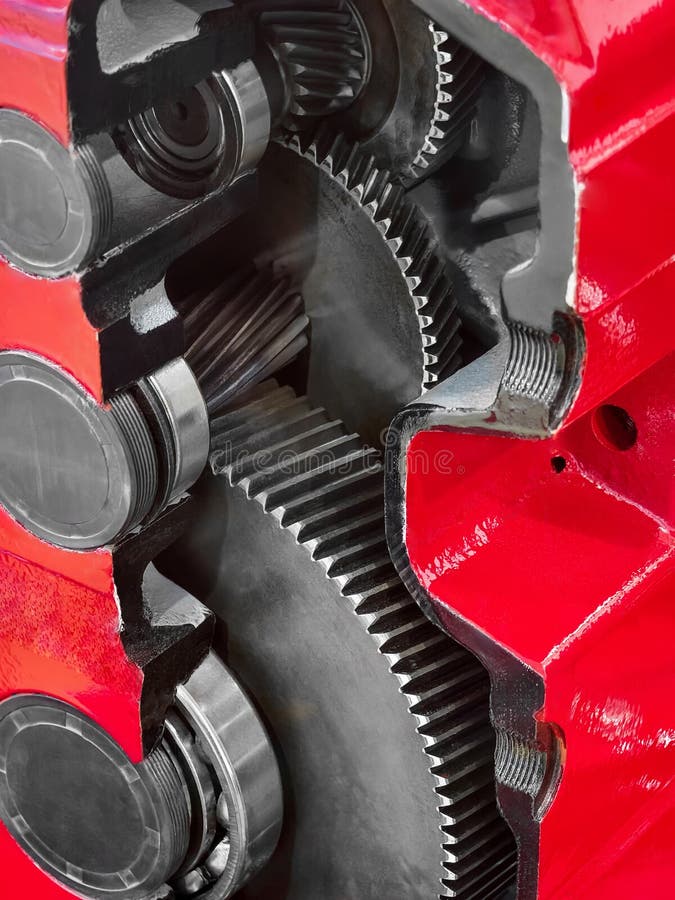 Detailed View of Mechanical Gears in a Red Engine Showcasing Intricate ...