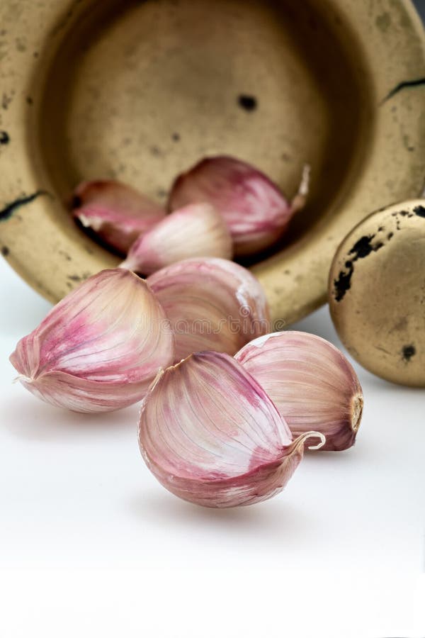 Close-up of Red Garlic in Mortar. White Background Stock Image - Image ...