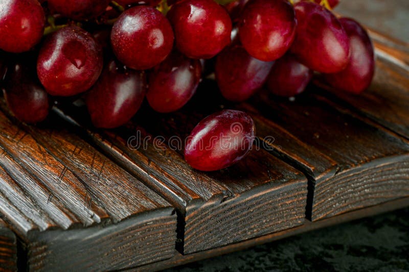 Close-up of Red Grapes. Side View Stock Image - Image of indoor, black ...