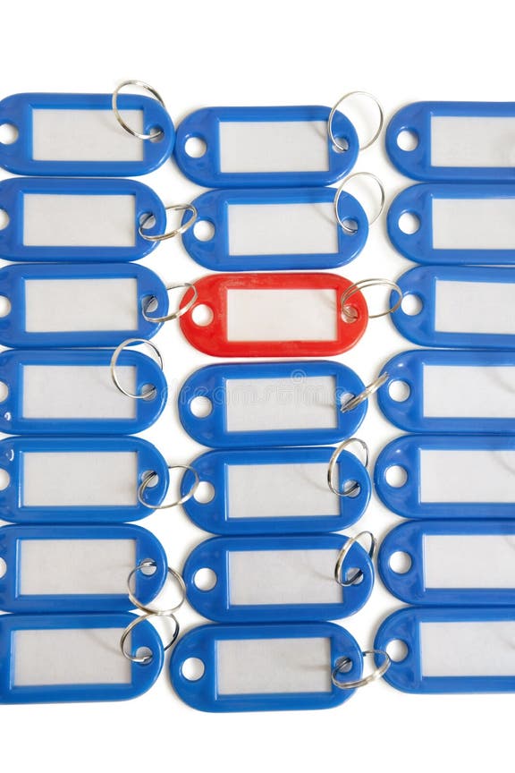 Close-up of Red Key Ring Tag Surrounded by Blue Tags Stock Photo ...