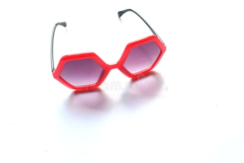 Close Up a Red Pentagon Shape Sunglasses Isolate on a White Background ...