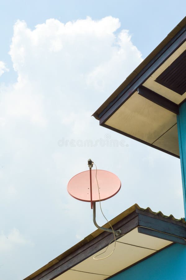 Red satellite dish at home stock image. Image of antenna - 113116549