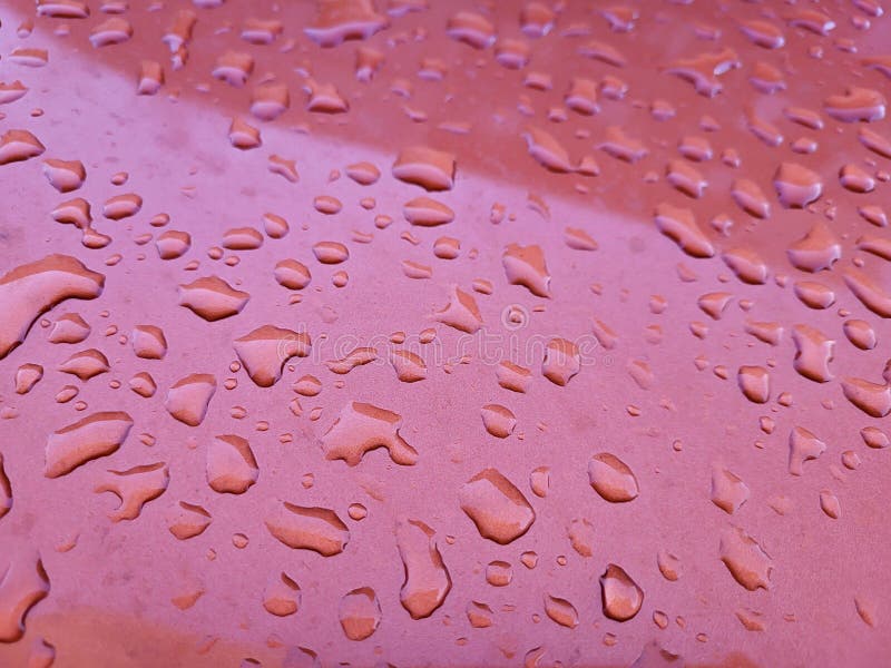 Close-up of the Red Surface of Car Paint with Raindrops. Stock Image ...