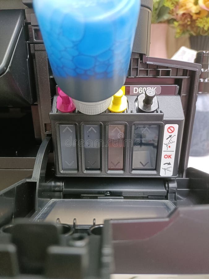 Close-up. Refilling Blue Ink into a Multifunction Printer Stock Image ...