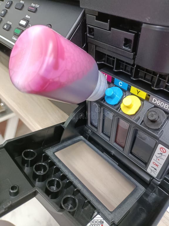 Close-up. Refilling Red Ink into a Multifunction Printer Stock Photo ...