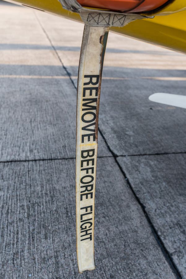 Remove before flight badge stock photo. Image of assist - 14268768