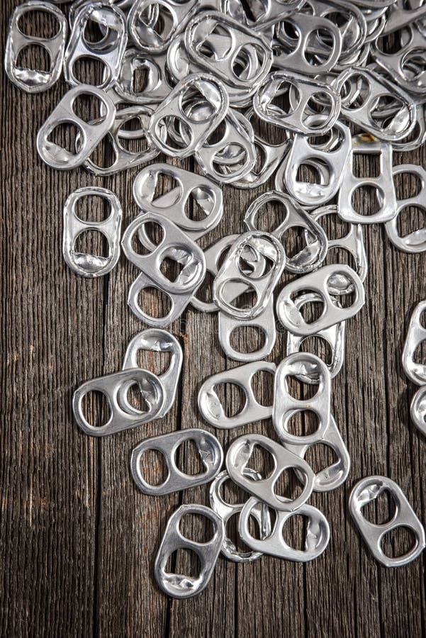 Close Up Rings Pull Aluminum of Soda or Beer Can Isolate on Wood ...