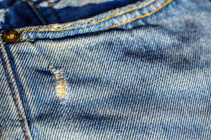 Close-up of a Ripped jean stock photo. Image of blue - 165420162