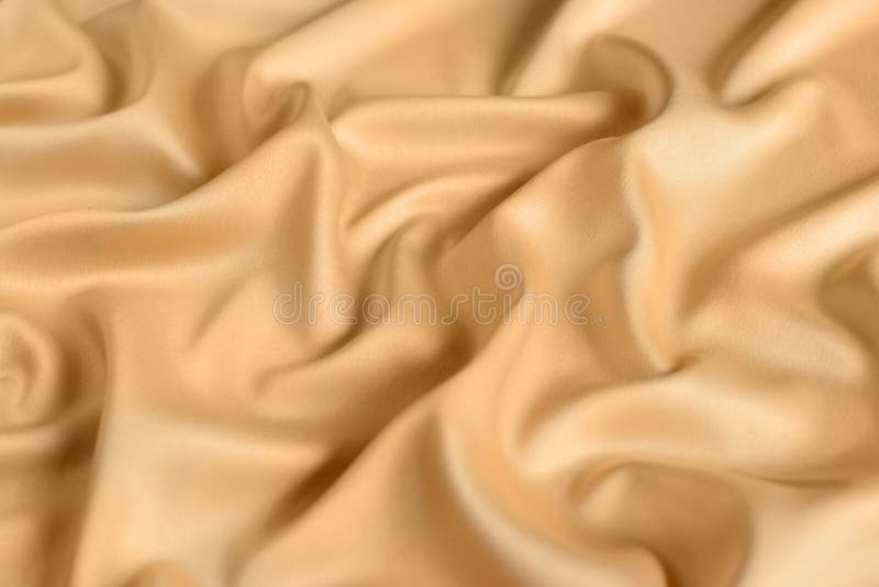 Close Up of Ripples in Gold Colored Silk Fabric. Satin Textile ...