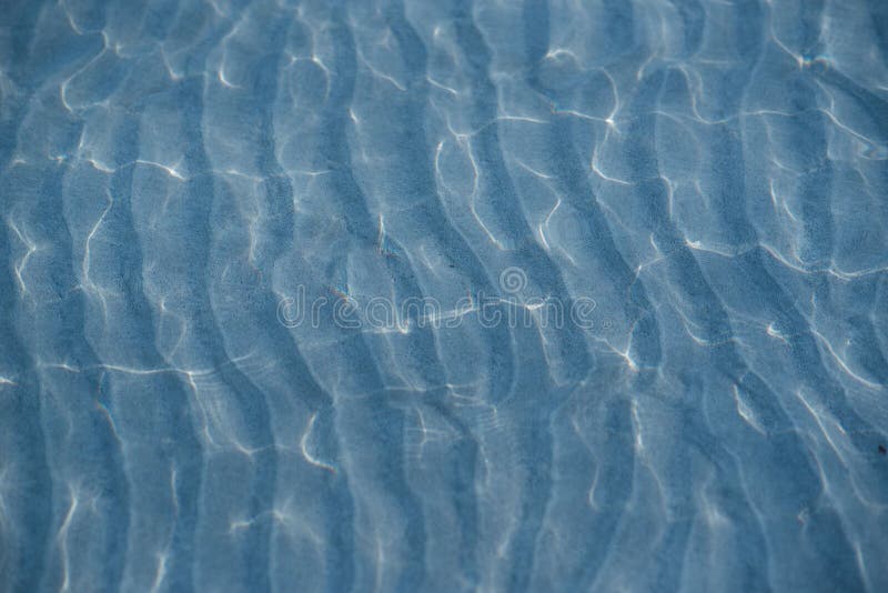 A Close Up of the Rippling Blue Water Surface with Waves Stock Photo ...