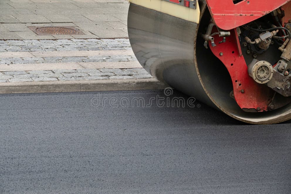 Close Up of Road Construction Asphalt Roller Machine at Work. Stock ...