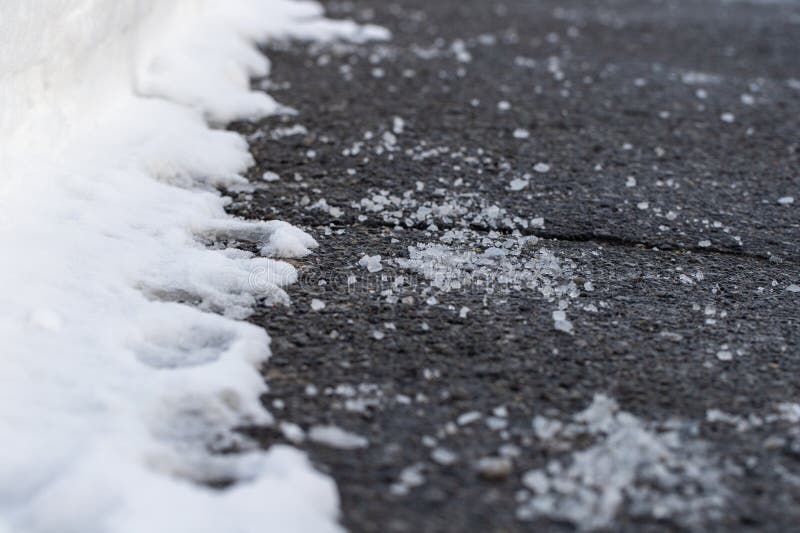 Road with Salt for Melting Snow in Winter. Stock Image - Image of ...