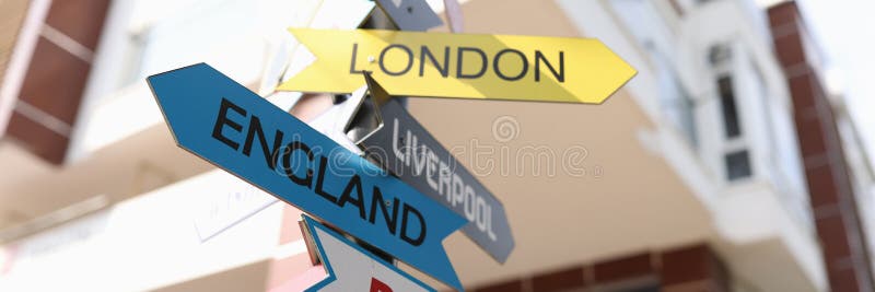 Road Sign with Pointers of Different Cities and Countries Stock Photo ...