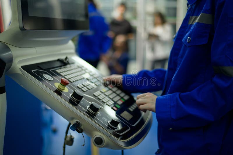 Close Up of Robotics Engineers Using Controller To Remotely Operate ...