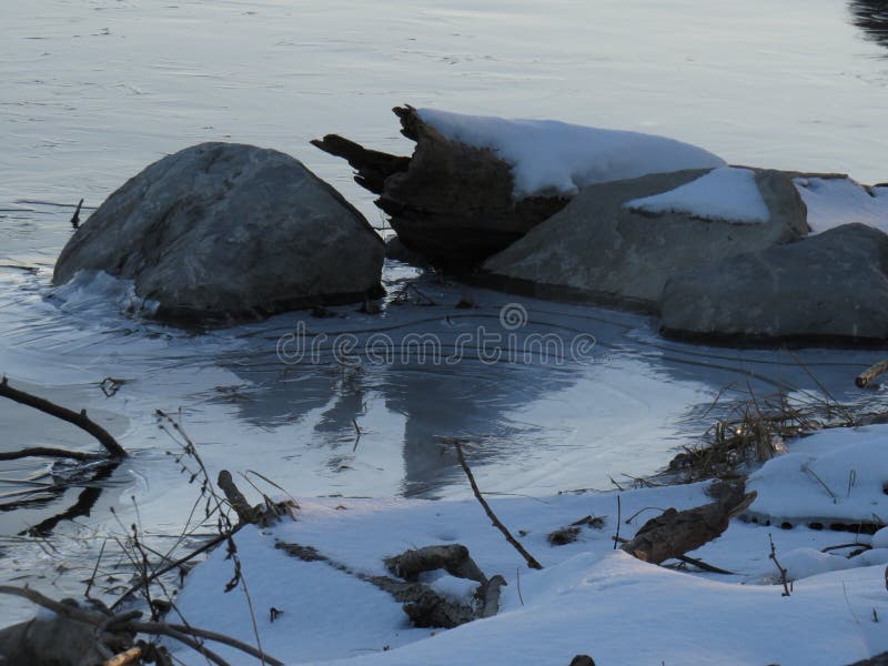 Close-up of Rocks in the Water, at the Beginning of Winter, with White ...