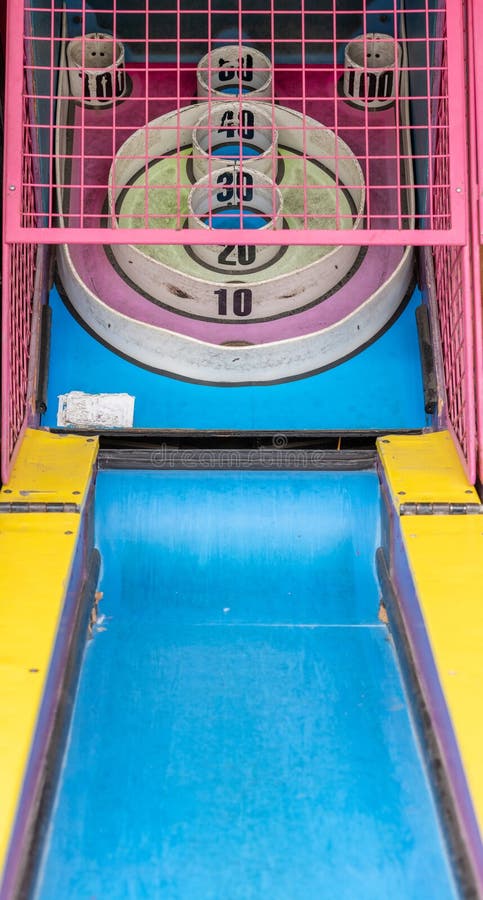 Close Up of Roll the Ball in the Point Holes at Arcade Stock Photo ...