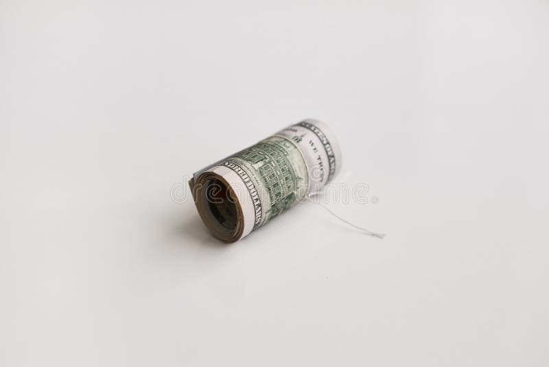 Close-up Rolled American Dollars Banknotes Tied Up with a Thread ...