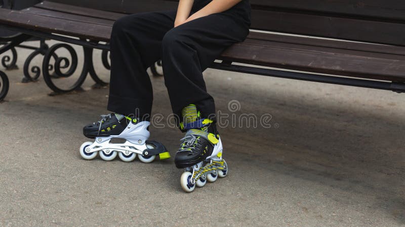 Close Up Roller Blades. Roller Skating Girl Kid in Park Rollerblading ...
