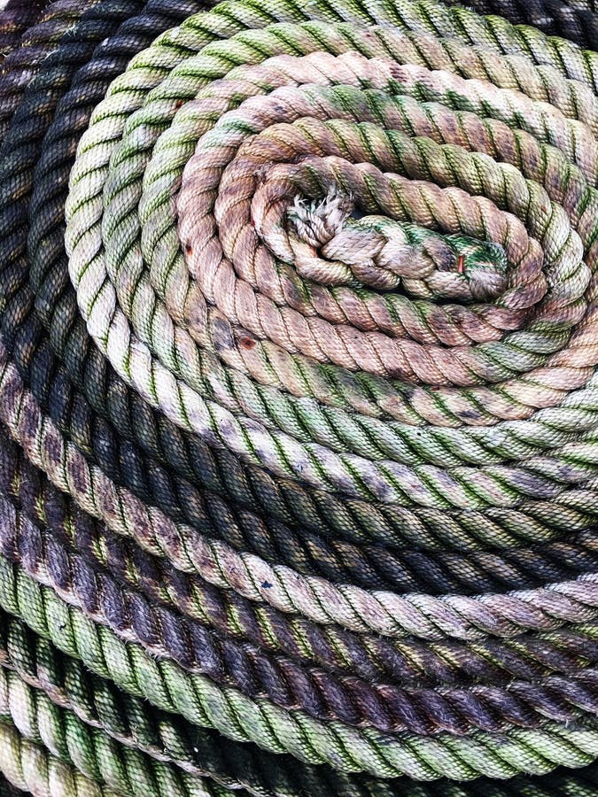 Close Up of a Rope Coiled on a Sailboat Stock Photo - Image of deck ...