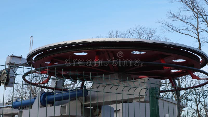 Close-up of the Ropewheel on the Background of the Blue Sky and Tree ...