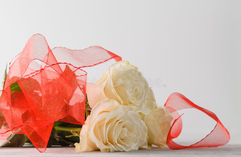 Close Up Roses and Red Ribbon on White Stock Image - Image of couple ...