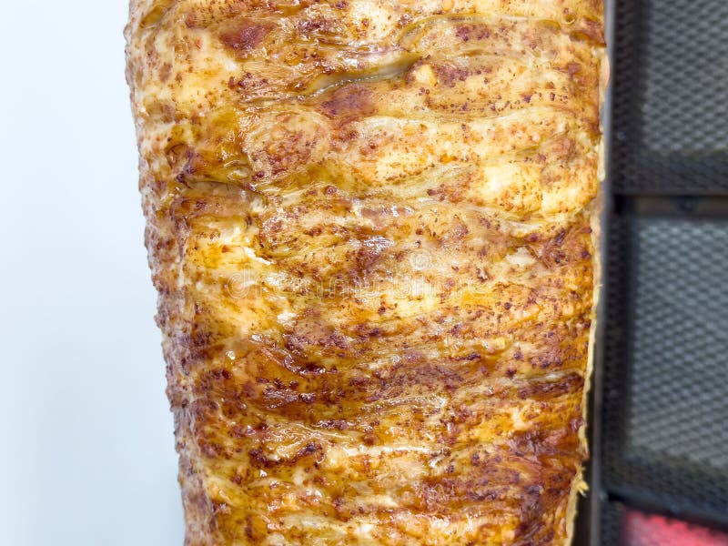 Close-up of Rotating Chicken Shawarma on Vertical Grill Stock Photo ...
