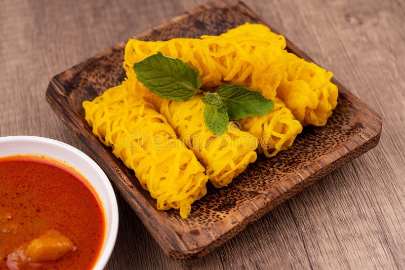 Roti Jala or Net Bread and Curry Sauce Stock Photo - Image of spice ...