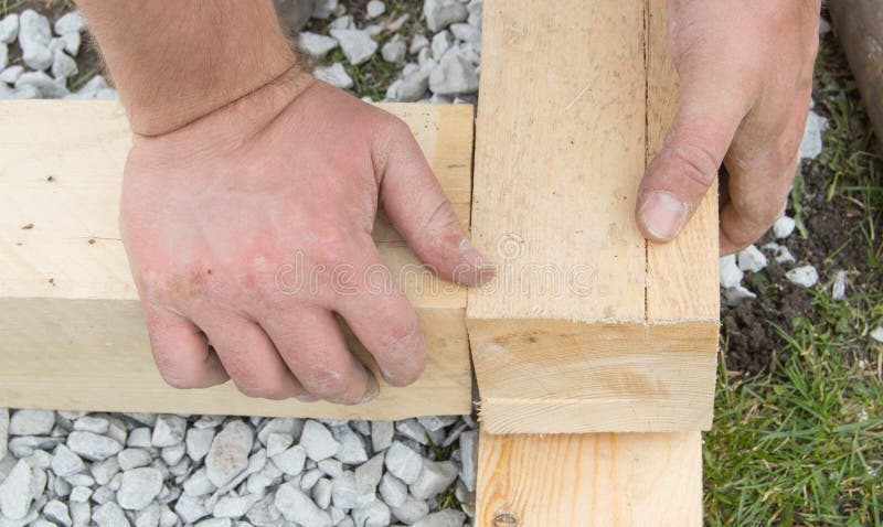 Close-up of Rough Male Hands Using New Lumber for Work, Outdoors Stock ...