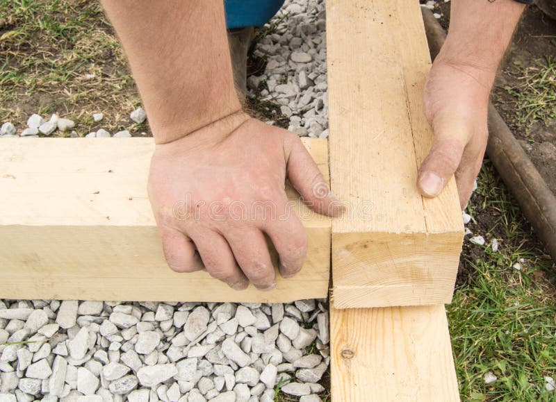Close-up of Rough Male Hands Using New Lumber for Work, Outdoors Stock ...