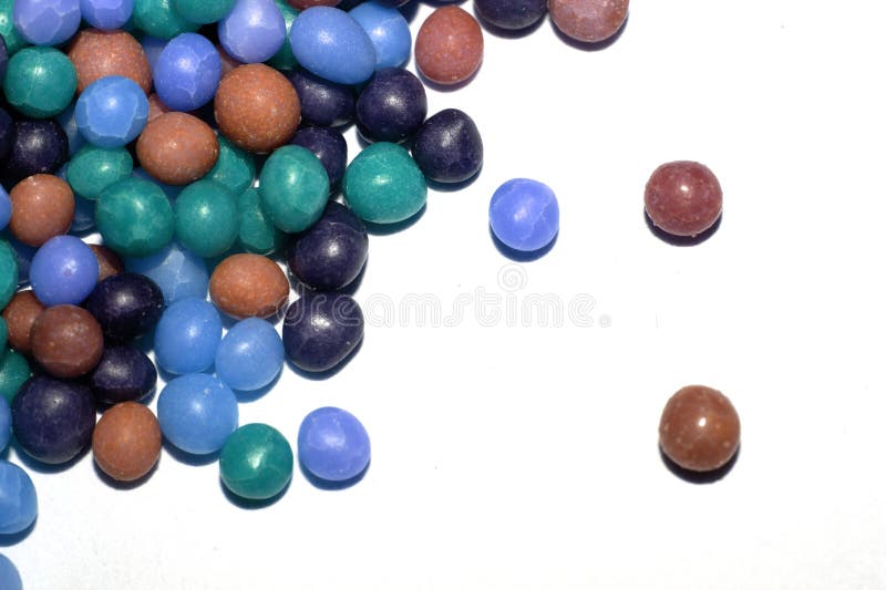 Close Up of Round Ball Sugar Ice Cream Cake Decorations on a White ...