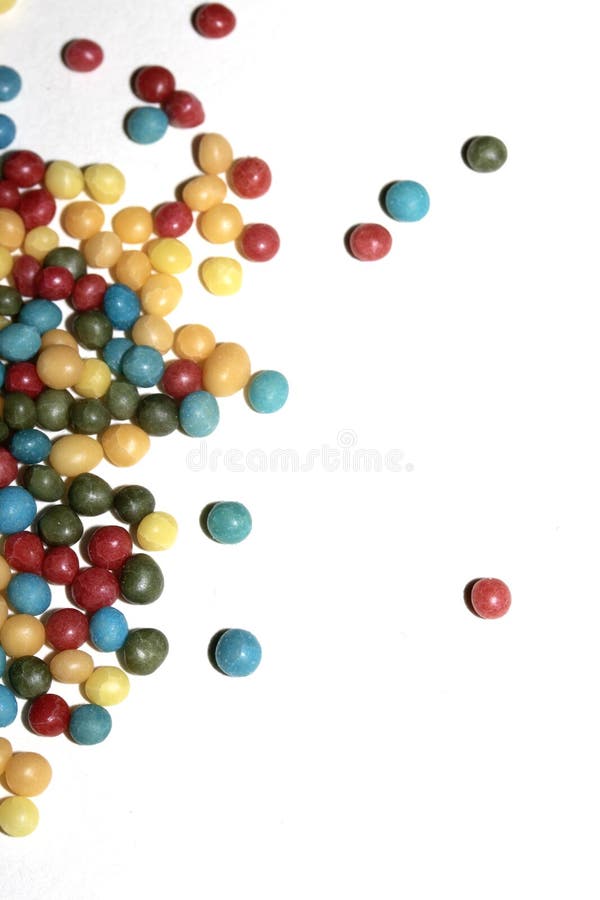 Close Up of Round Ball Sugar Ice Cream Cake Decorations on a White ...