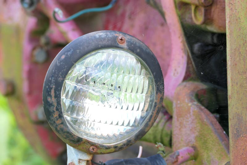 Headlight of an Old Tractor Stock Photo - Image of grate, headlight ...