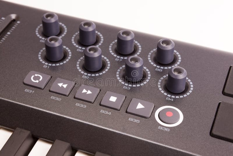 Close-up of a Row of Knobs on a MIDI Controller Keyboard Stock Photo ...