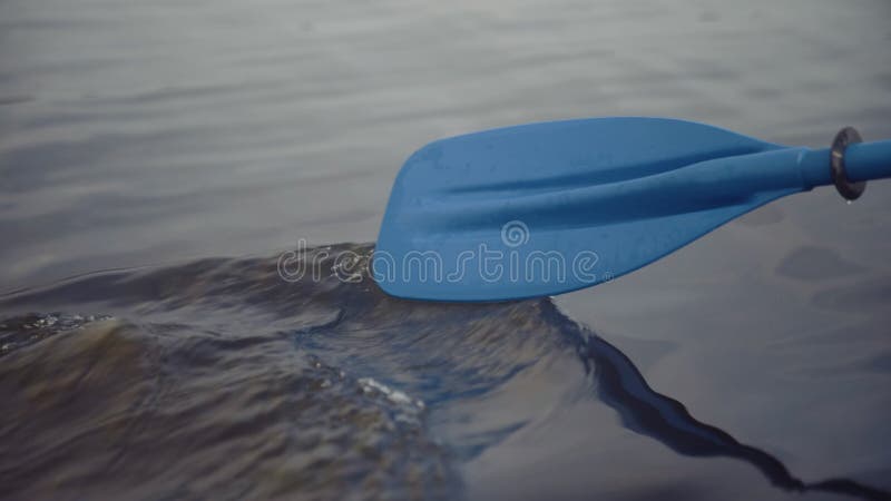 Close-up of a Rower on a Boat Rowing with an Oar. Stock Footage - Video ...