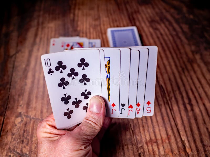 Close Up of a Human Hand Holding Playing Cards Stock Photo - Image of ...