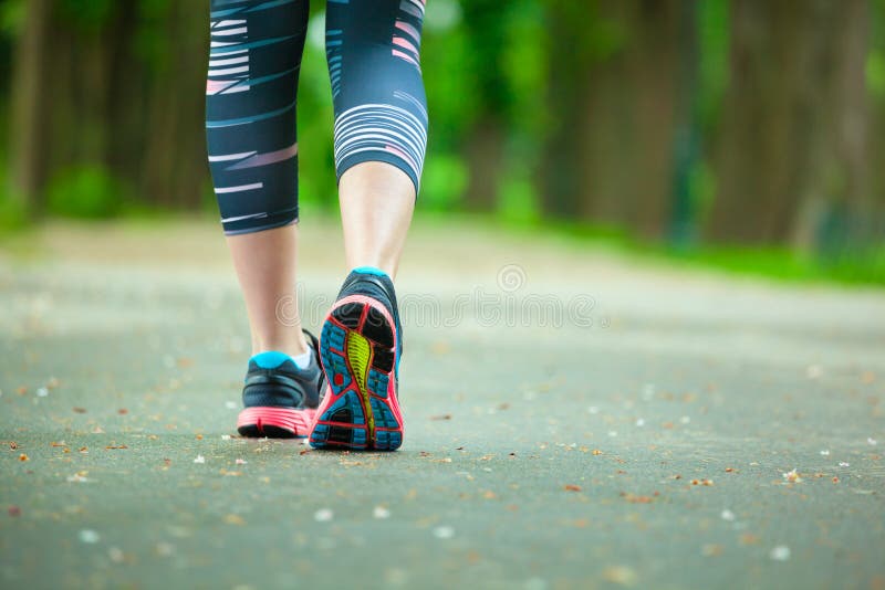 Close Up of Running Shoes on Road. Stock Photo - Image of footwear ...