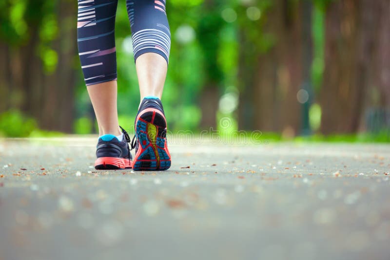 Close Up of Running Shoes on Road. Stock Photo - Image of footwear ...