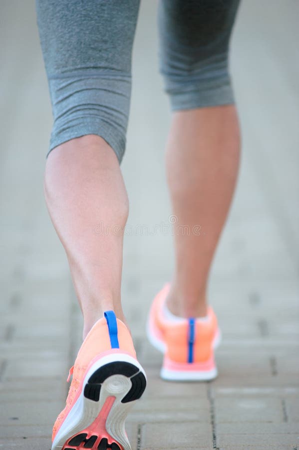 Close Up of Running Shoes on Road. Rear View Stock Image - Image of ...