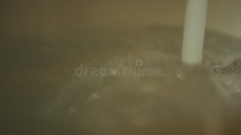 Close-up of Running Water Pouring into a Sink, Movement and Texture of ...
