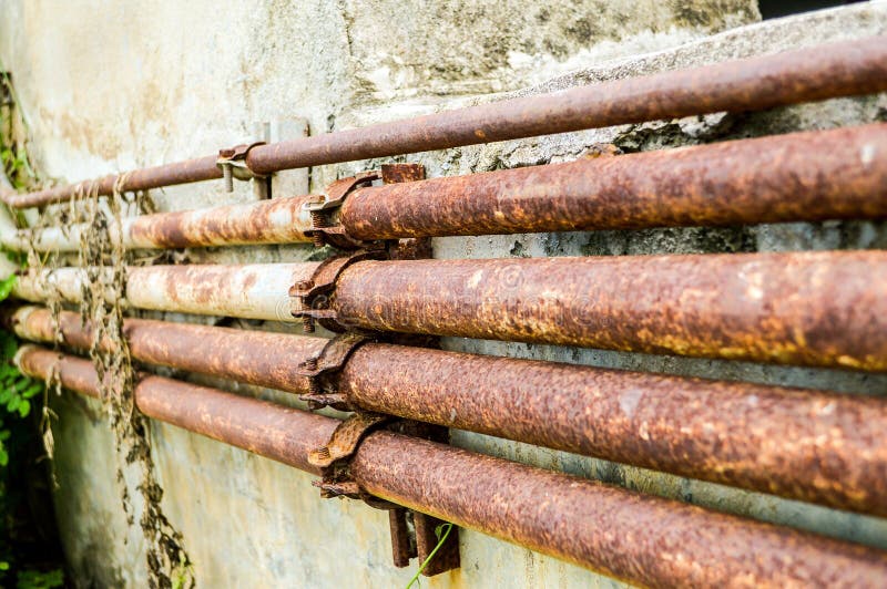 Rust metal pipes stock photo. Image of tube, industrial - 169357538