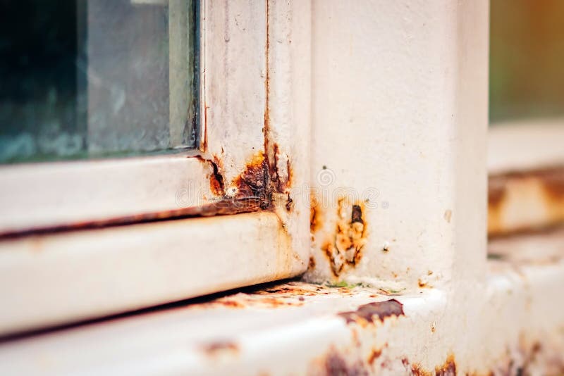 Close Up of Rust on an Old White Iron Window in the Corner of the Frame ...