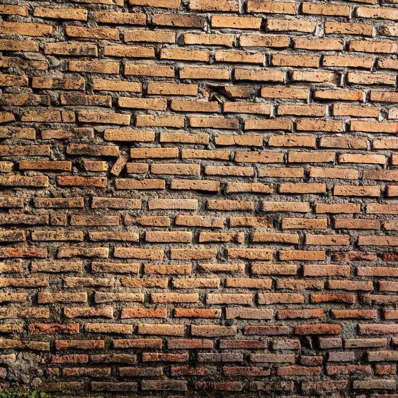 Close-up of Rustic Brick Wall with Natural Textures and Warm Orange ...