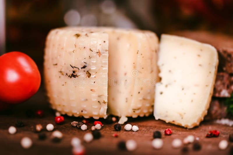 Rustic Cheese with Herbs, Pepper and Tomatoes Stock Image - Image of ...