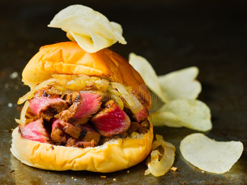 Rustic Steak Sandwich with Onions Stock Photo - Image of pink, rare ...