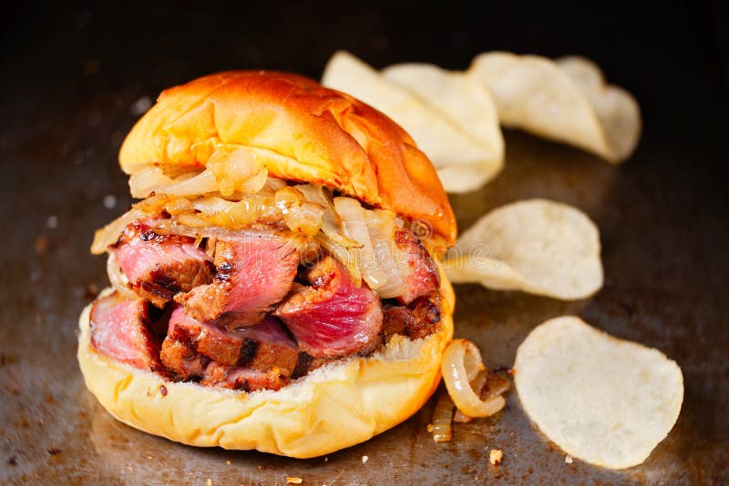 Rustic Steak Sandwich with Onions Stock Image - Image of barbequed ...
