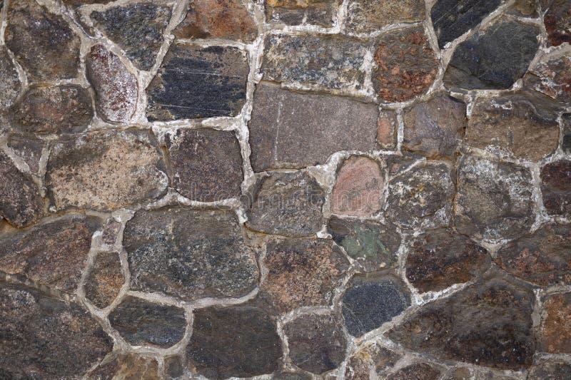 Close-up of a Rustic Stone Wall with Irregular Shapes and Natural ...