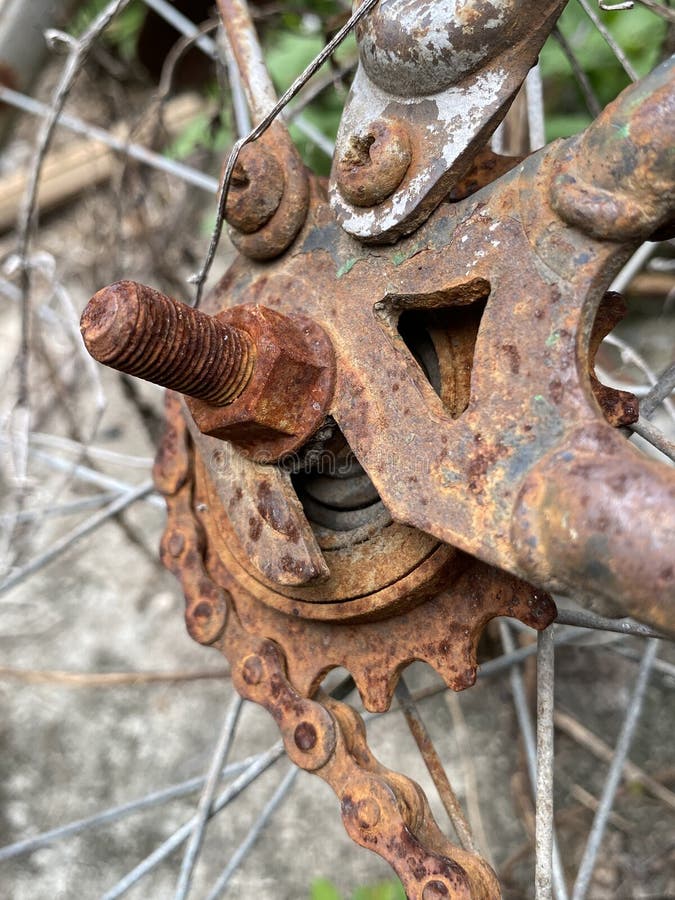 Rusty Bicycle Wheel on a Chain Stock Photo - Image of rust, wheel ...