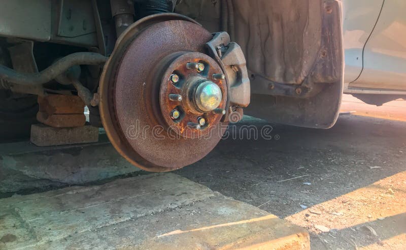 Rusty Broken Car with Missing Wheel Stock Image - Image of boneyard ...